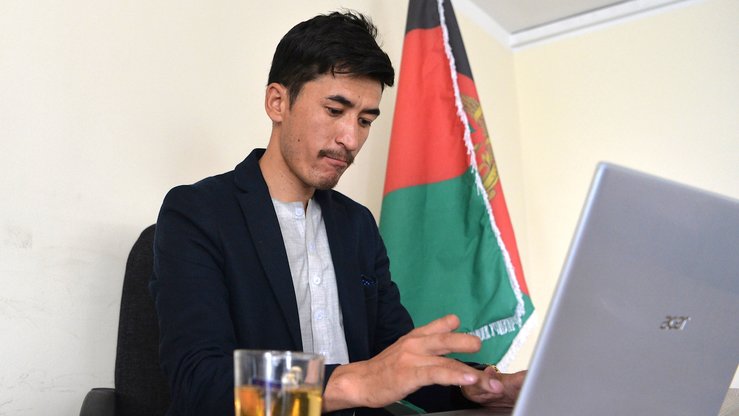 Afghan writer defiantly votes despite previous Taliban punishment